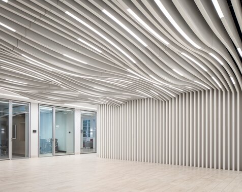 Metalldecken │Nachhaltige Deckensysteme aus Metall | Lindner Group